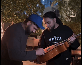 Video: Rohit Sharma Gives His Autograph On Fan's Guitar During Music ...