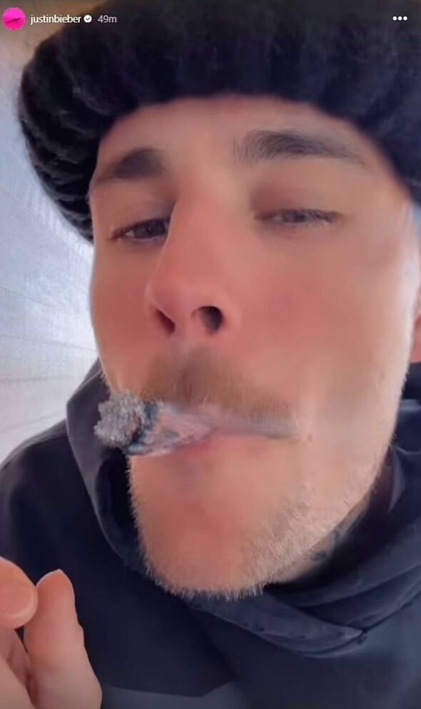 Justin Bieber sparks concern as he puffs smoke and grins at camera in video