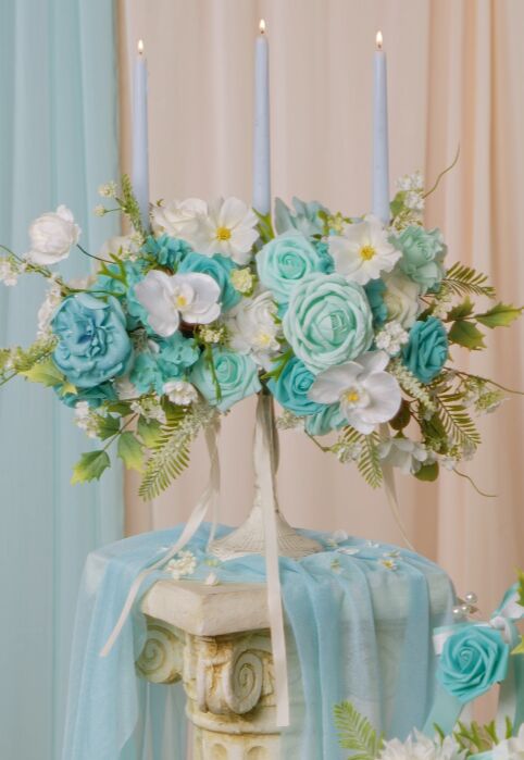 How to Make a Candlestick Decoration With Artificial Flowers