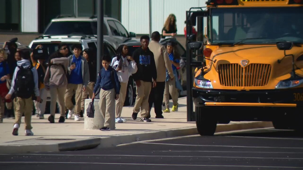 Elementary school parents hold little ones close after 2 young student ...