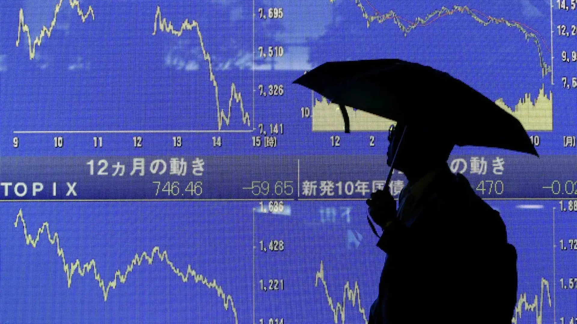 Japan Stocks Plunge as Chip Selloff and Trump Tariffs Spark Market Jitters