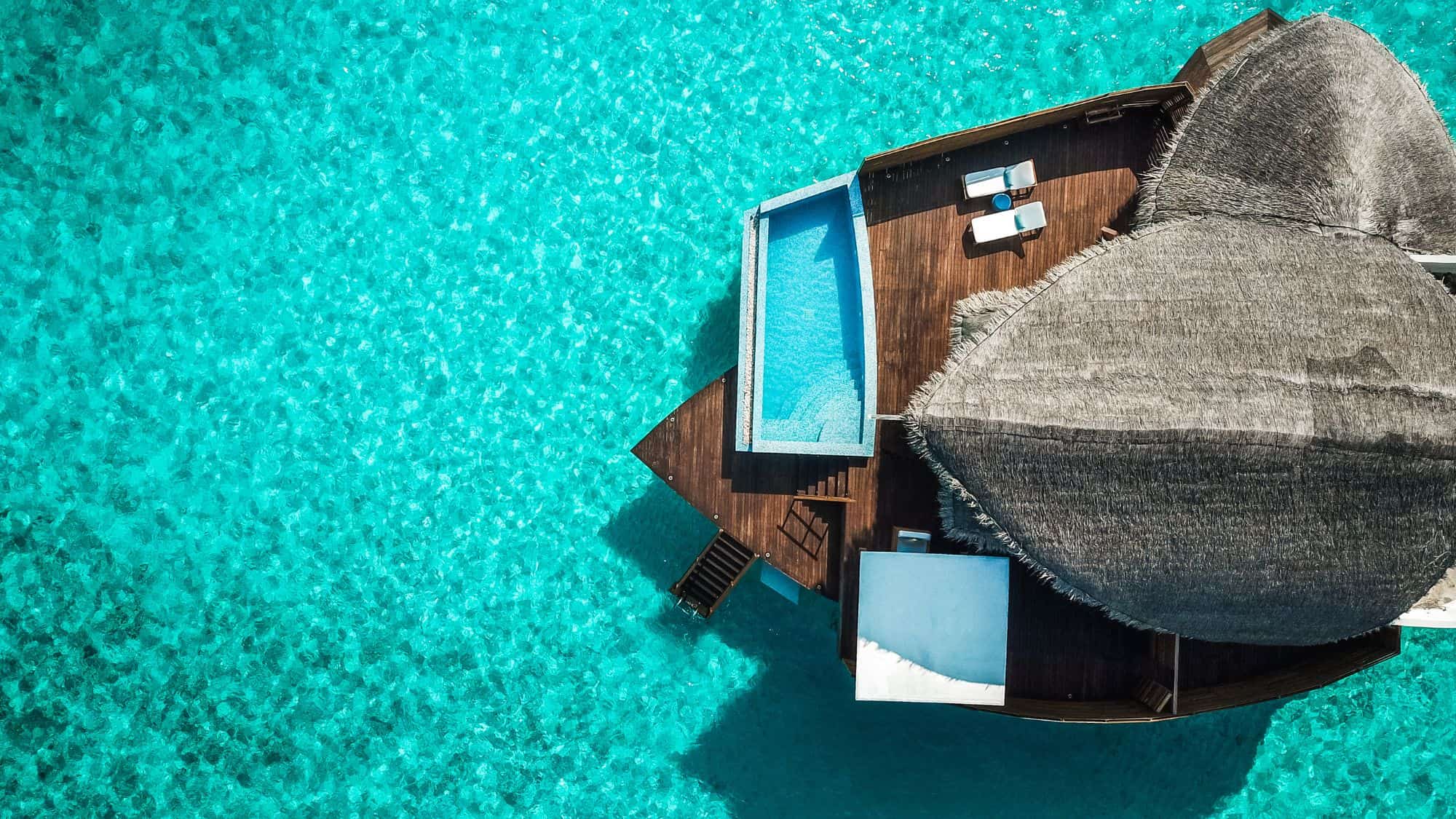 11 Overwater Villas With Private Pools That’ll Ruin Regular Hotels For You