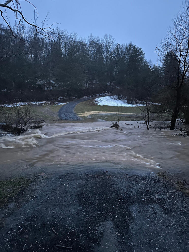 Three Appalachian Power linemen rescue driver from floodwaters