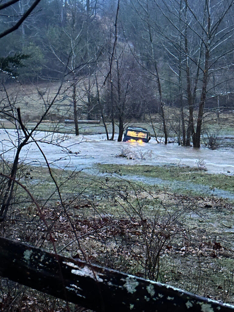 Three Appalachian Power linemen rescue driver from floodwaters
