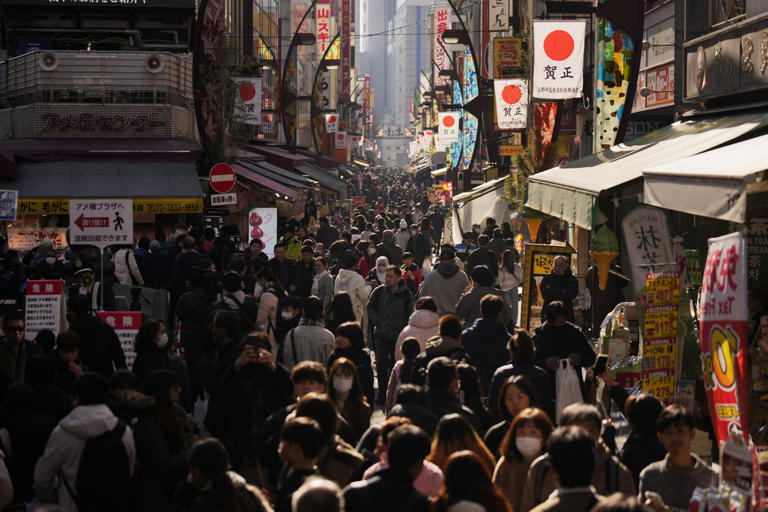 Japan's economy grows more than expected on strong exports and moderate ...