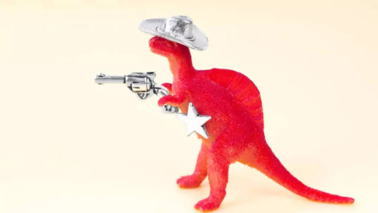'Laugh Or Panic?' 'Armed' Robber Tries To Rob Bank With Dinosaur-Shaped ...