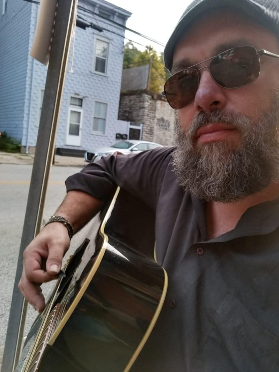 'Grandpa Doom': Man killed in West End shooting was talented musician ...