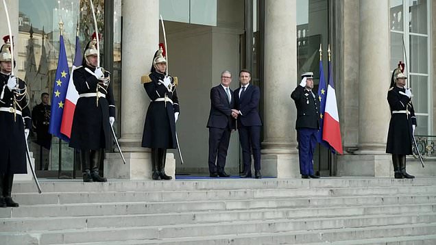 Starmer and Macron's handshake battle: Moment PM arrives in Paris