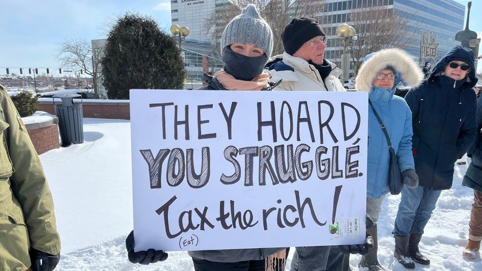 Protesters gather in South Bend to oppose executive overreach and Musk ...