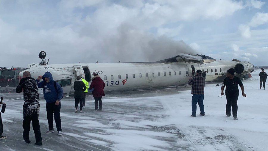 Delta flight flips over in Toronto, injuring 18 people