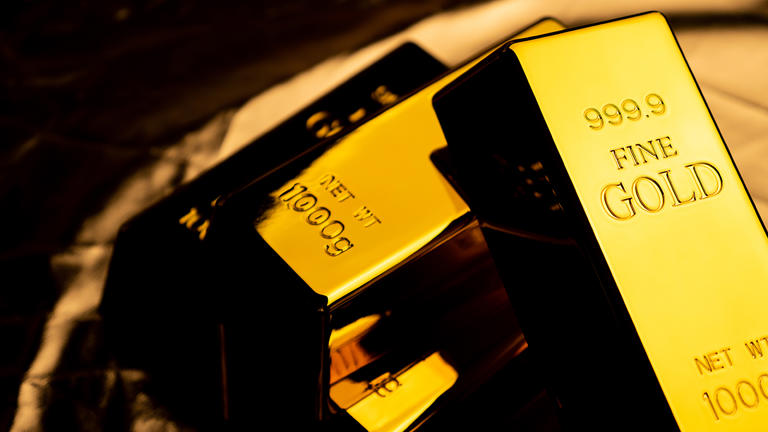 Gold price rises above $3,000 an ounce for first time amid economic ...