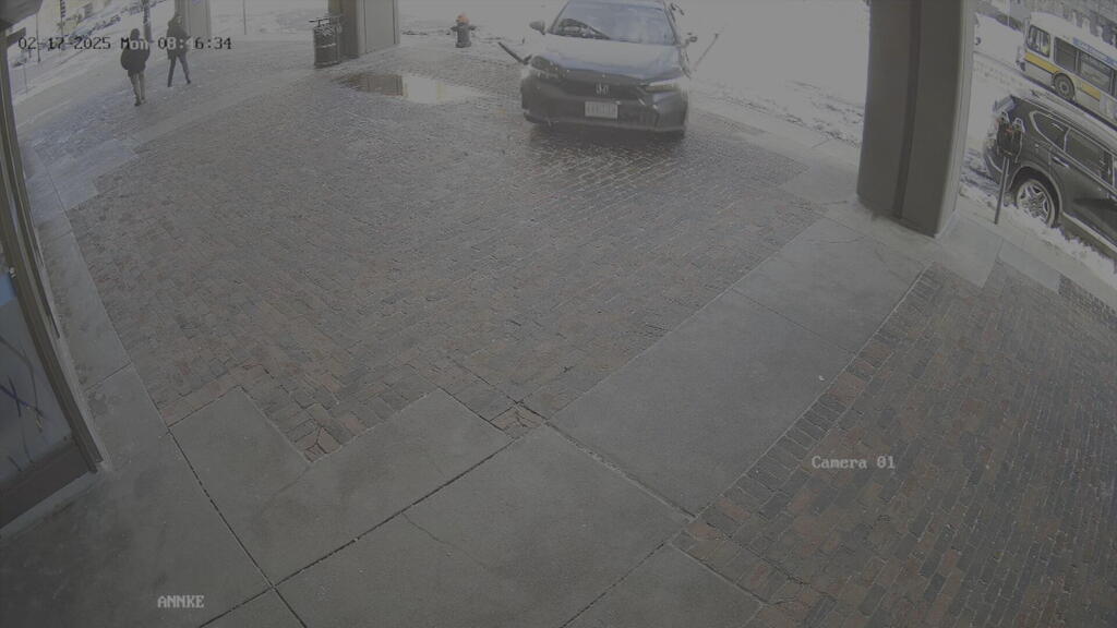 Video shows car lose control and crash into building near Boston City Hall