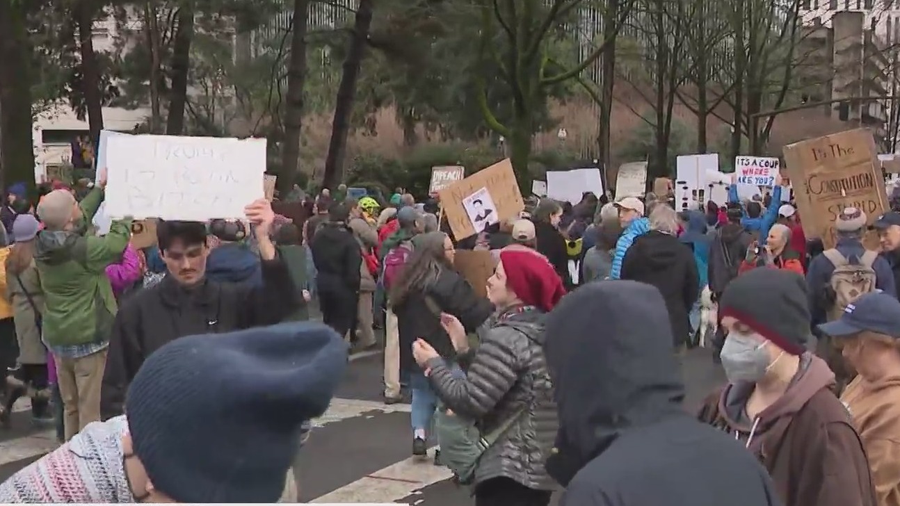 '50501' protesters block street in front of Portland City Hall