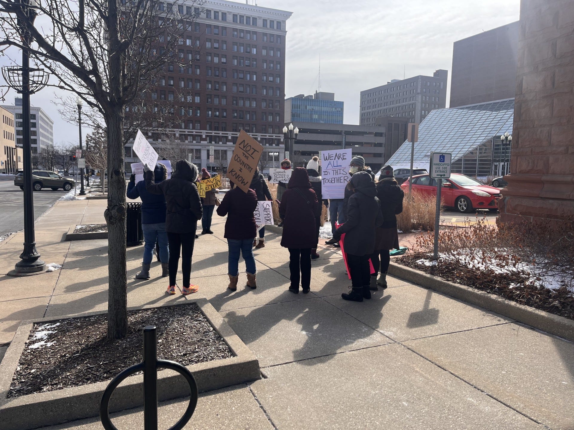'Very dangerous times': Protesters in Peoria decry Trump as a 'traitor ...