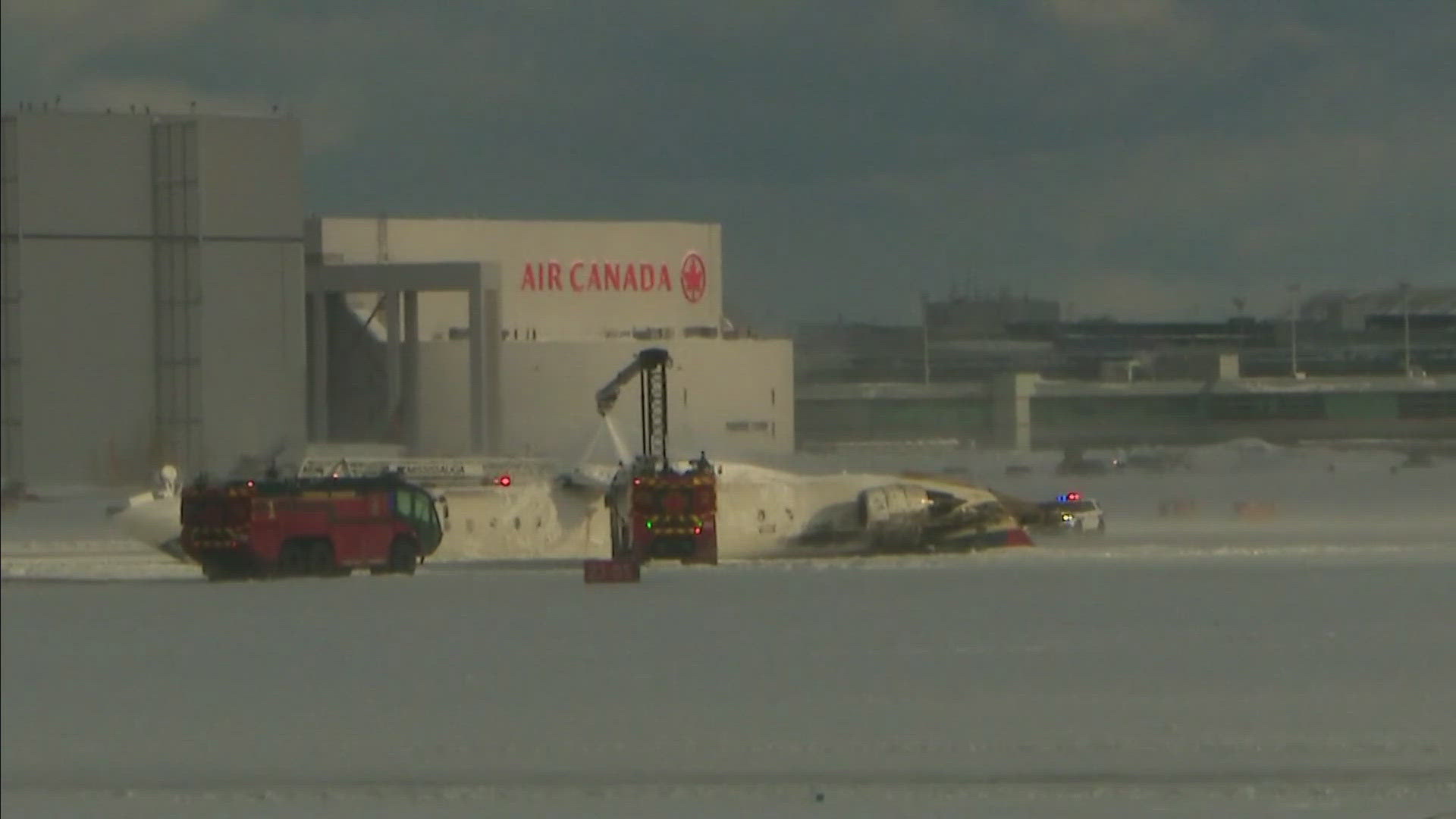 Delta plane flips on landing in Toronto