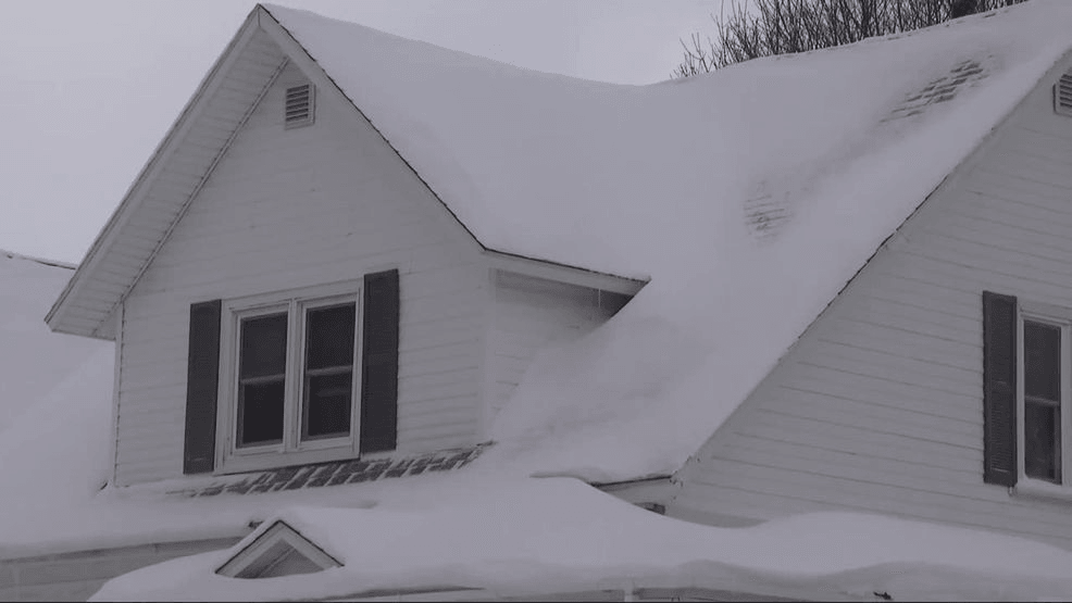 Residents urged to check roofs as snow buildup threatens homes