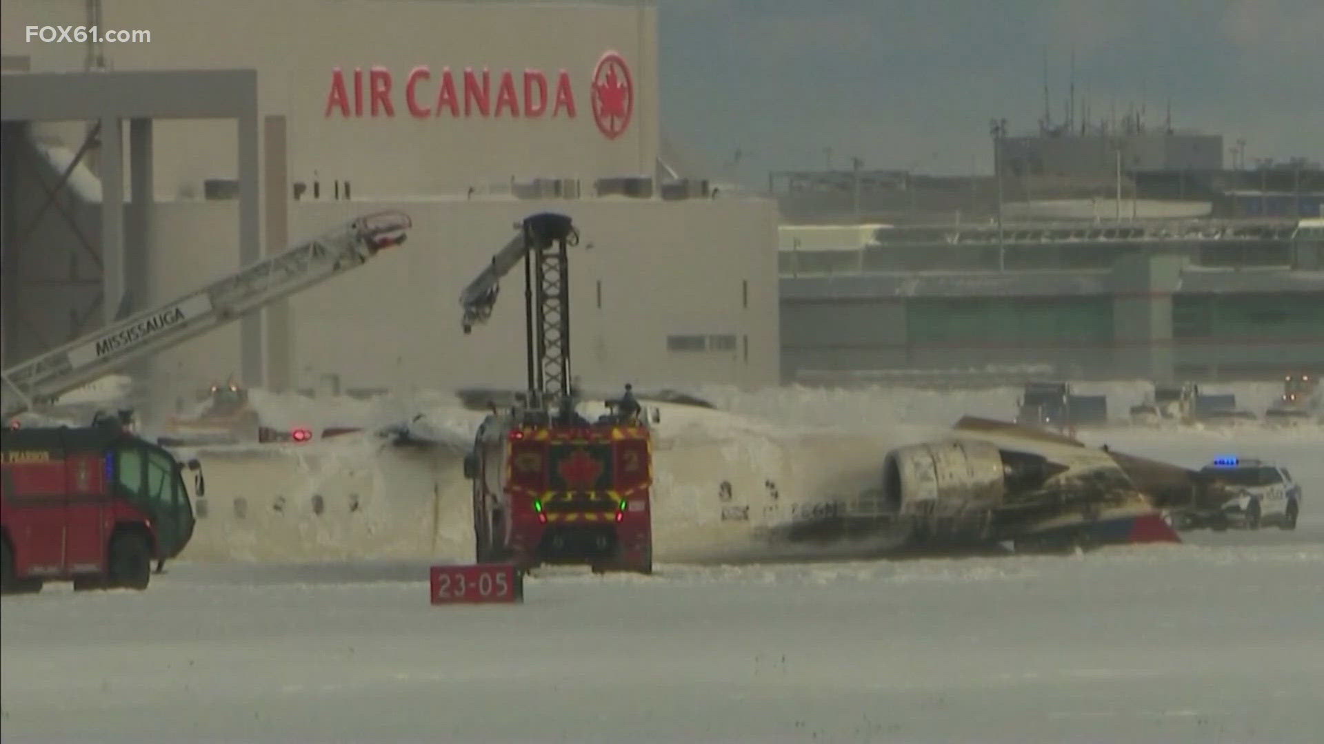 17 injured after Delta plane flips upside down, crashes at Toronto ...