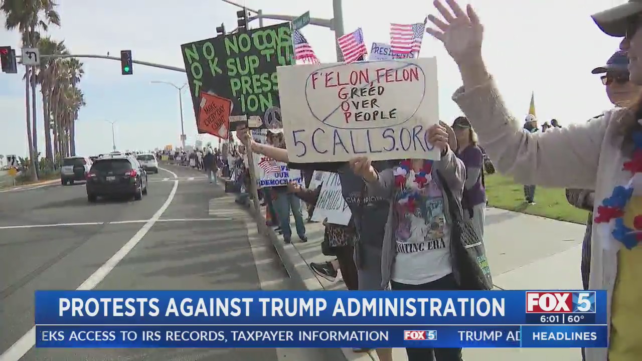 Hundreds in San Diego protest Trump's orders and federal layoffs