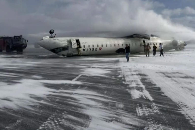 New video shows Delta plane flip during landing on Toronto runway which ...