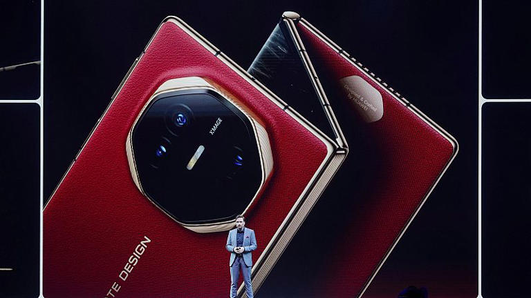 Huawei launches the world's first tri-foldable smartphone despite ...