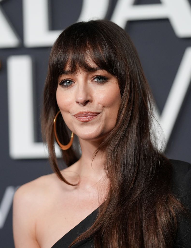 Dakota Johnson Shows Us How To Master A Daring Over-The-Hip Split