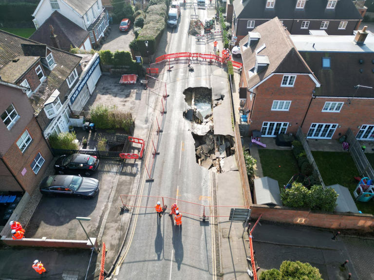 Godstone sinkhole: Buildings evacuated and part of high street closed ...