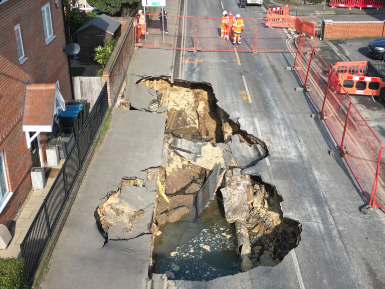 Godstone sinkhole: Buildings evacuated and part of high street closed ...