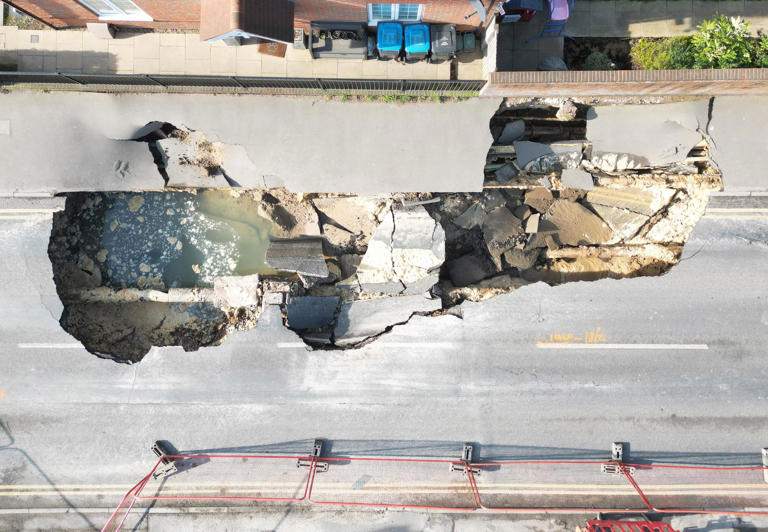 Godstone sinkhole: Buildings evacuated and part of high street closed ...