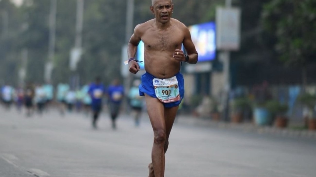 Can you really run a marathon without shoes? Meet speedy Barefoot Bobby