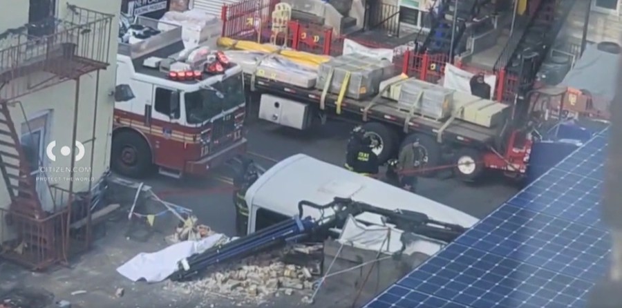 Boom truck falls on sidewalk, injures two in Brooklyn