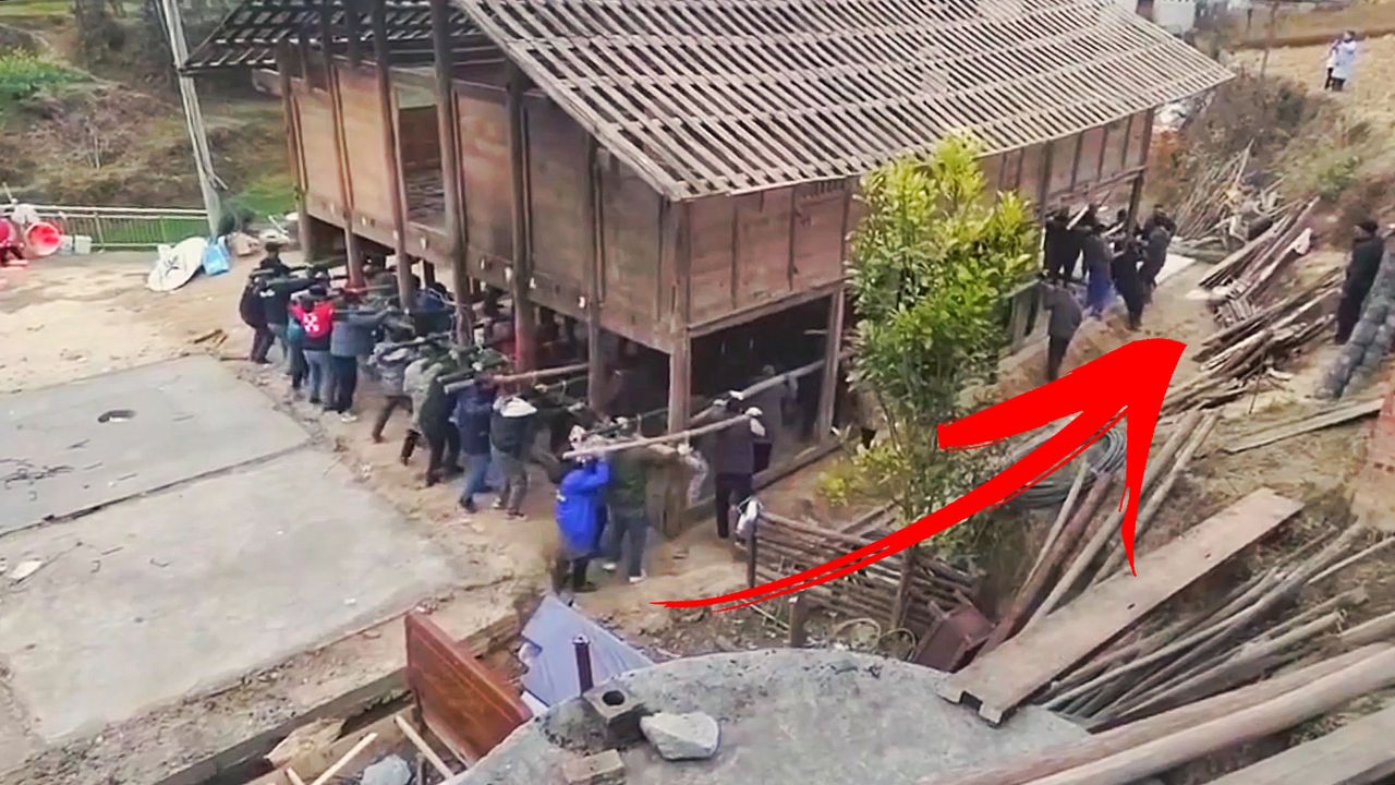 Residents band together to lift and move home 150 feet