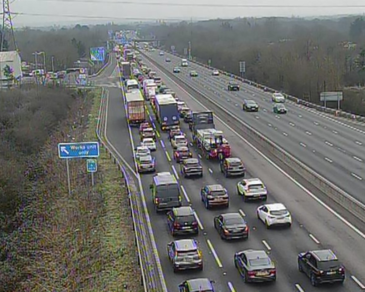 Four people in hospital after crash involving three cars and a lorry ...