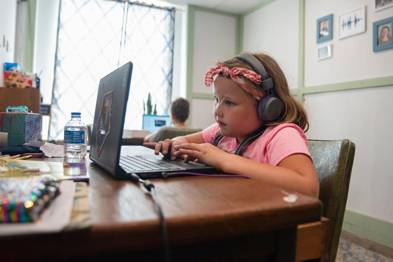 Gov. Kim Reynolds signs bill aimed at raising Iowa students' math ...