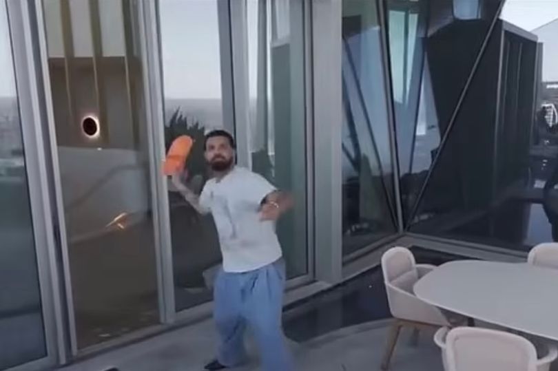 Drake throws his shoe at mystery drone flying on his balcony in new ...
