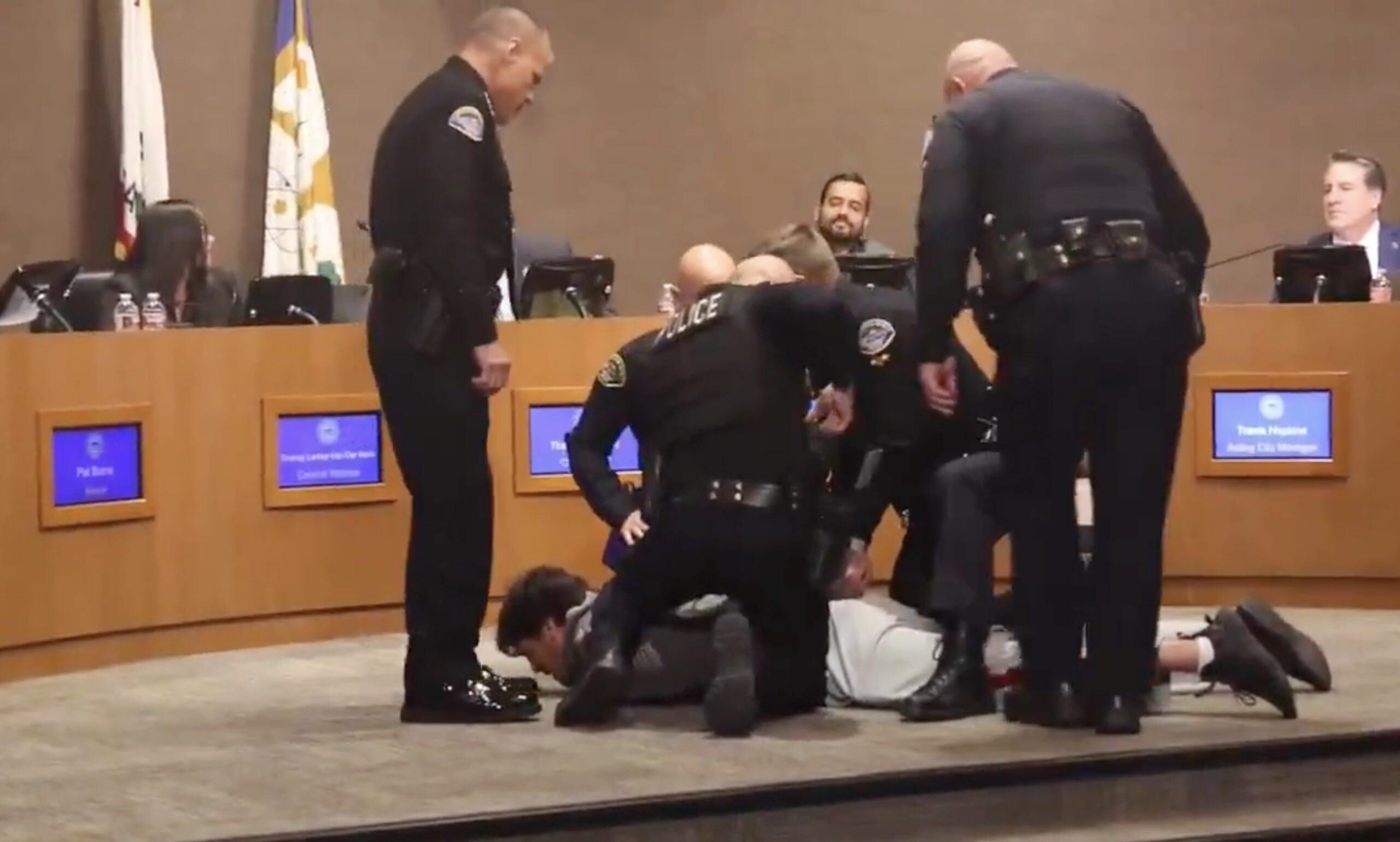 Former NFL Punter Dragged Out of City Council Meeting by Cops: ‘MAGA Is ...