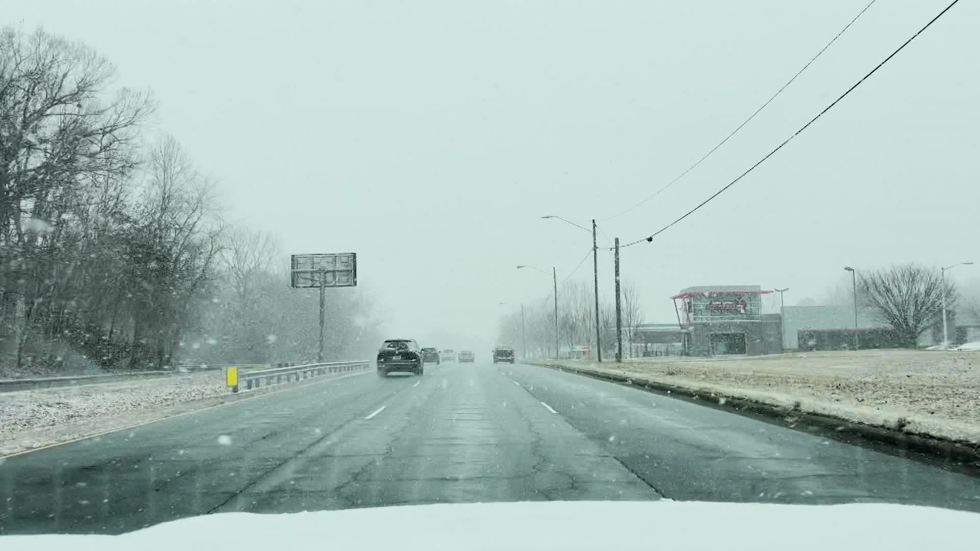 Dashcam video captures snow coming down around Winston-Salem