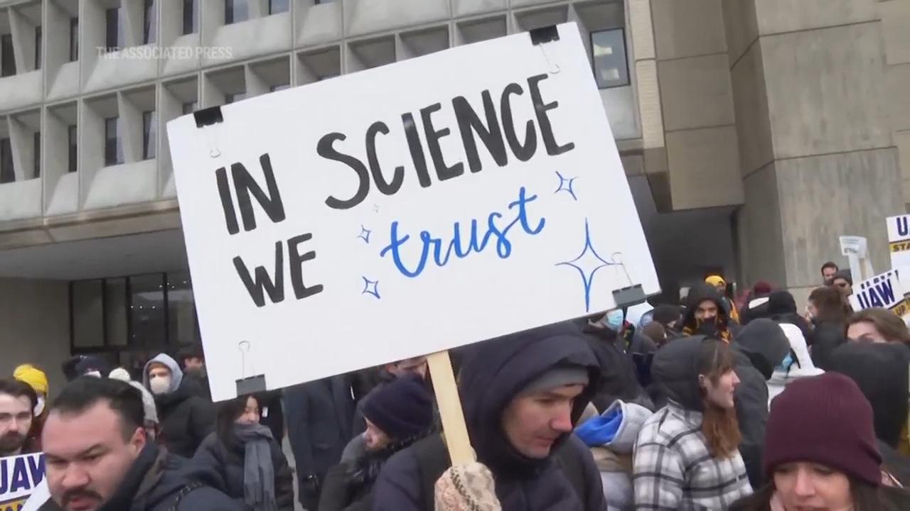 Scientists protest Trump's federal layoffs and funding cuts to health ...