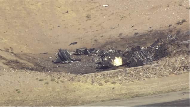 Helicopter footage shows wreck of 'mid-air collision' that left two dead