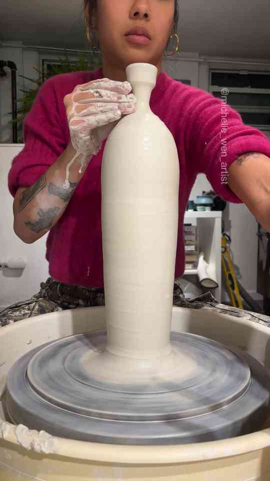 Crafting a Tall Ceramic Vase on the Pottery Wheel