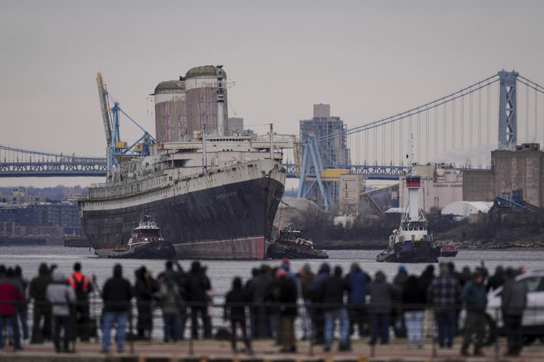 Historic ocean liner departs Philadelphia on voyage to become the world ...