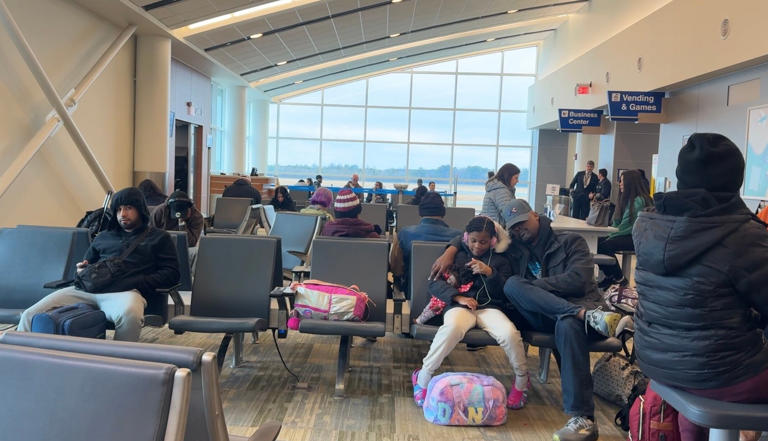 Travelers at Albert J. Ellis airport weigh in on winter storm