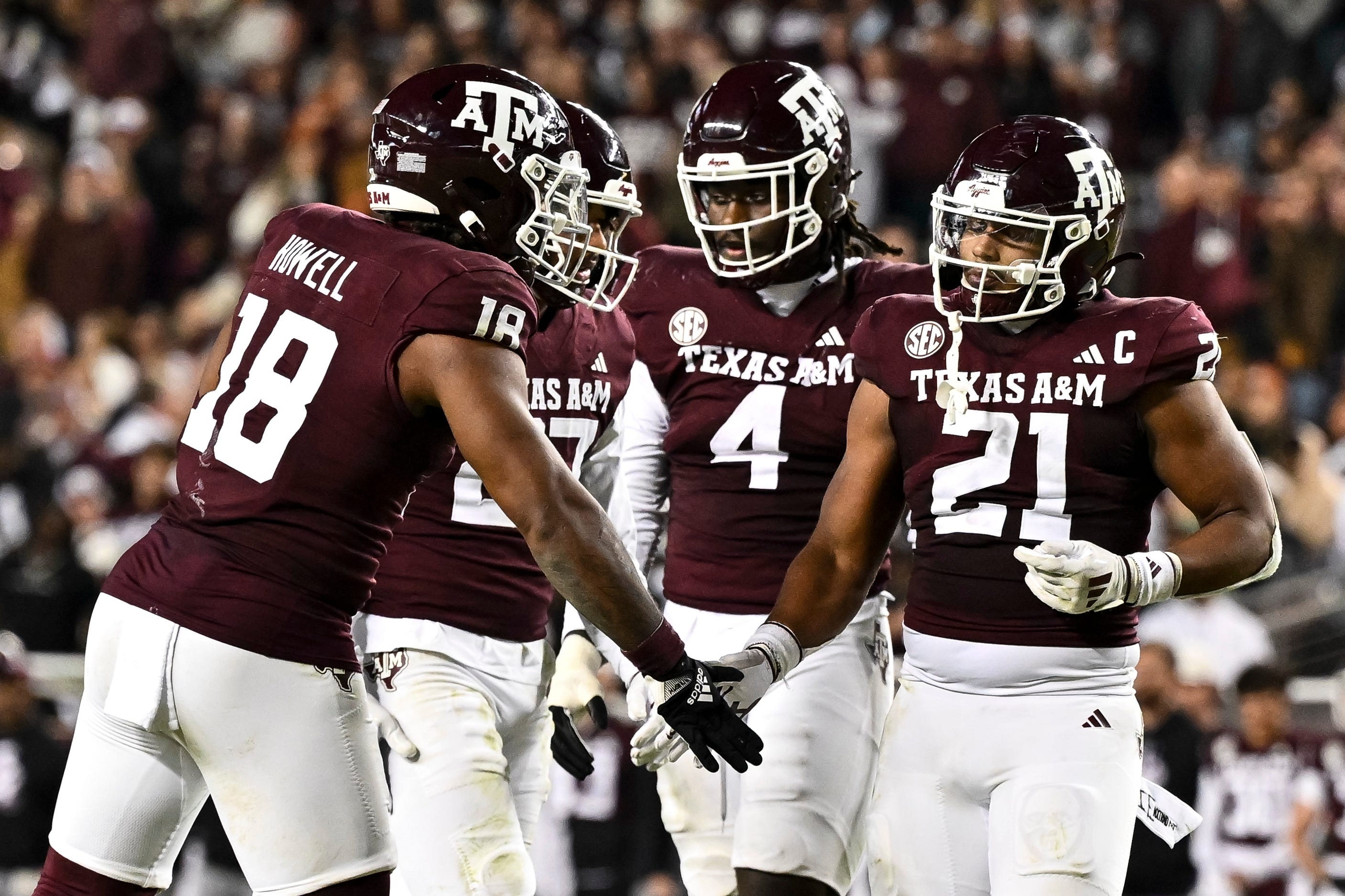 Watch several Texas A&M football players build strength in the weight ...