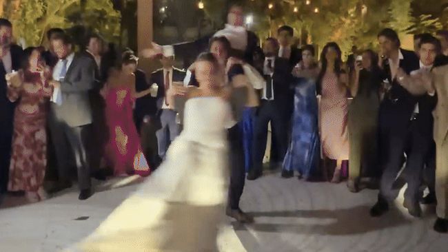 Bride and Groom's Attempt at Elaborate Helicopter Dance Move Doesn't Go ...
