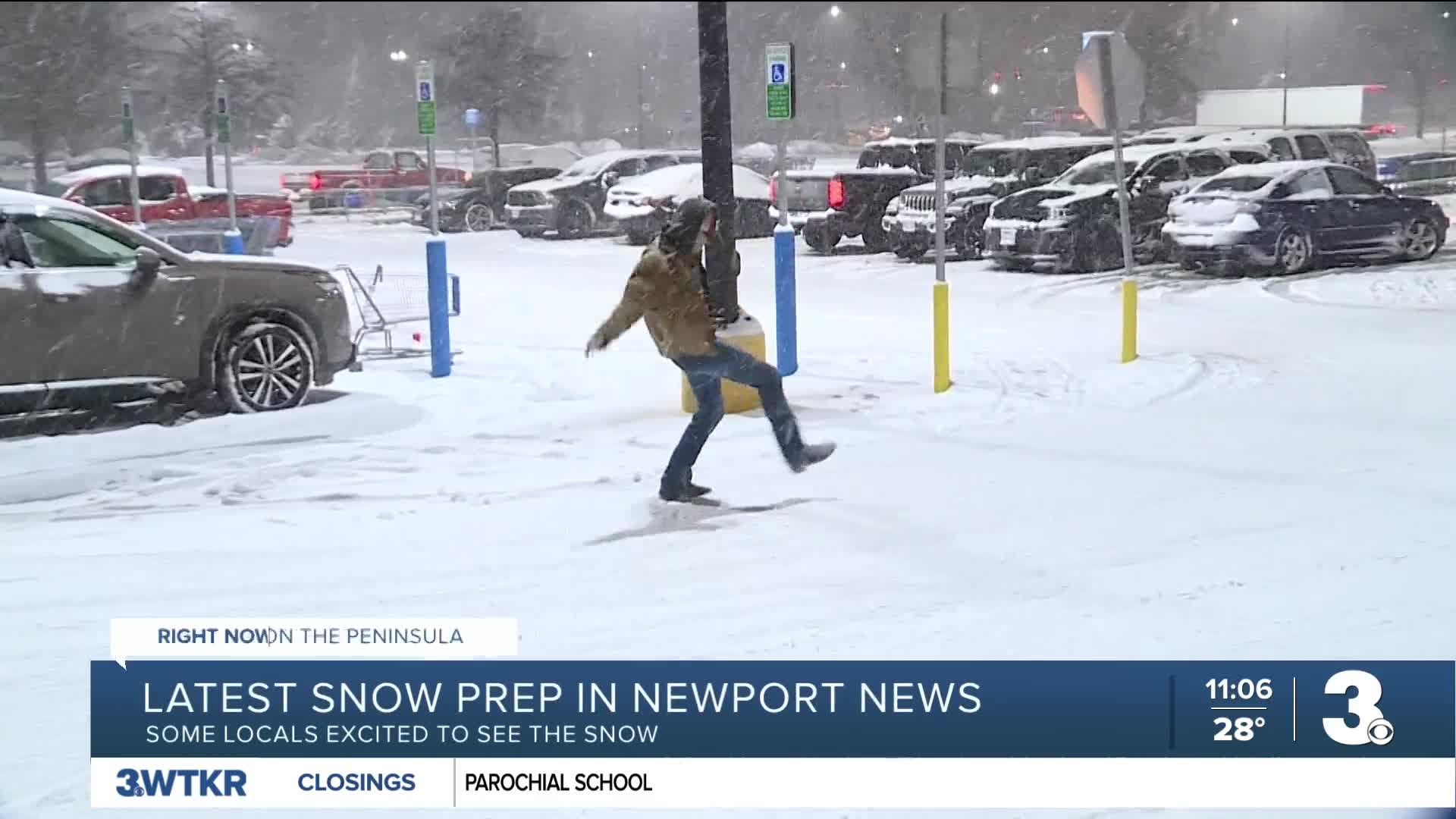 Snow continues to fall steadily, locals still stocking up