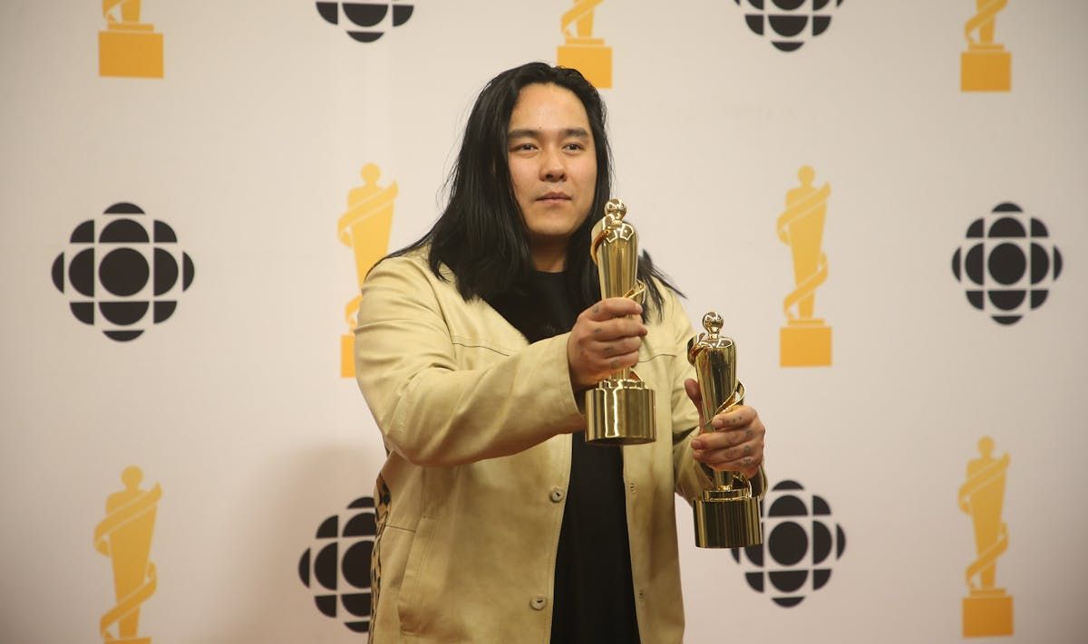 Juno winner Aysanabee performing at Marigold Cultural Centre