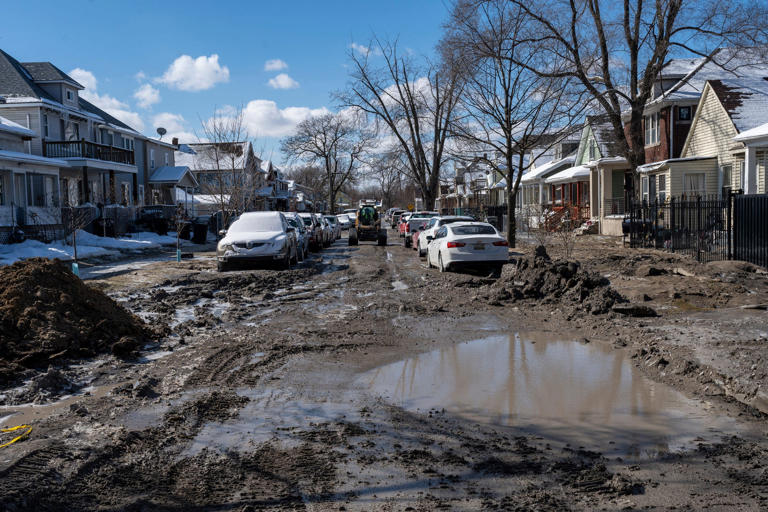 Floods and frozen cars: Photos show aftermath of water main break in ...