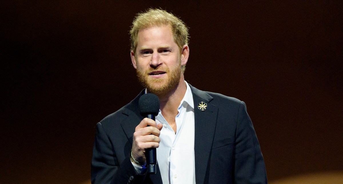 Camera Captures Ethereal Photo of Prince Harry Standing All Alone on Stage