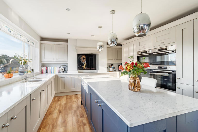 Inside this impressive, modern home with open plan kitchen and great ...