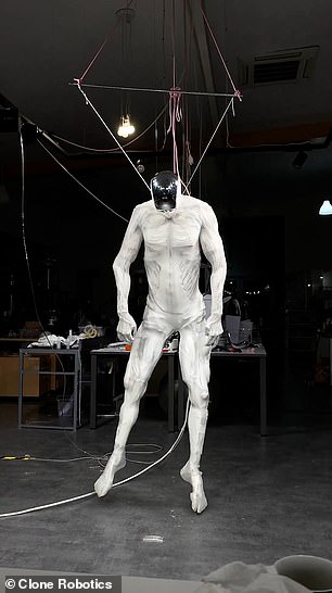 'Synthetic human' robot twitches and spams into LIFE in creepy clip