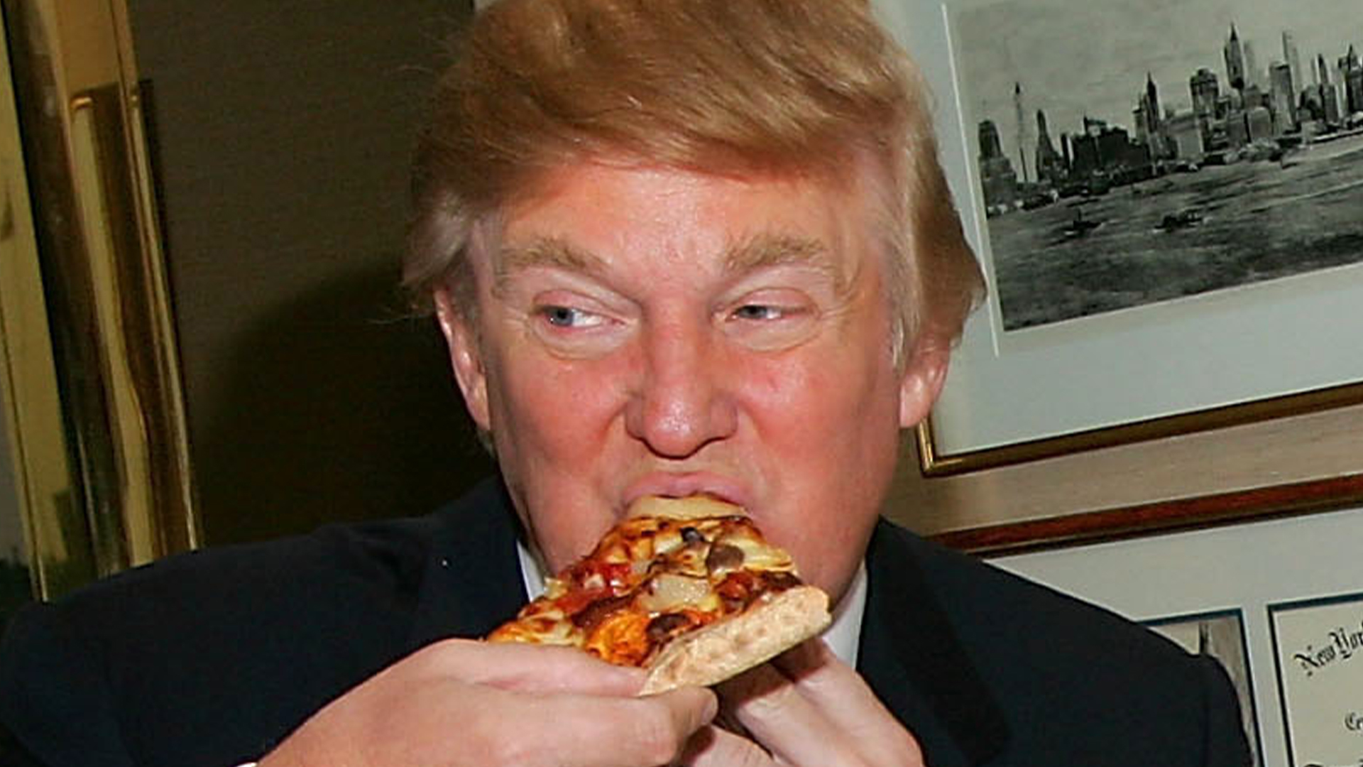 The Bizarre Way Trump Eats Pizza Has Us Scratching Our Heads
